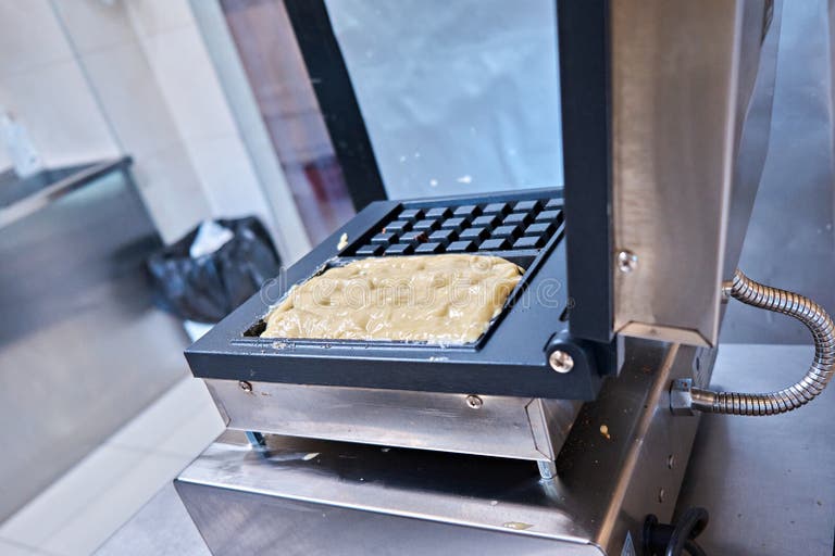 The Process of Making Waffles. Pour the Waffle Batter into the Waffle ...