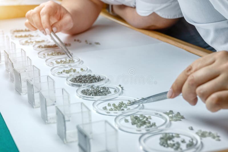 The Process of Manual Sorting of Diamonds. Gemstones are Graded by ...