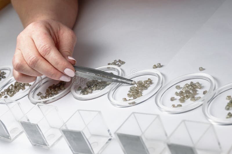 The Process of Manual Sorting of Diamonds. Gemstones are Sorted by ...