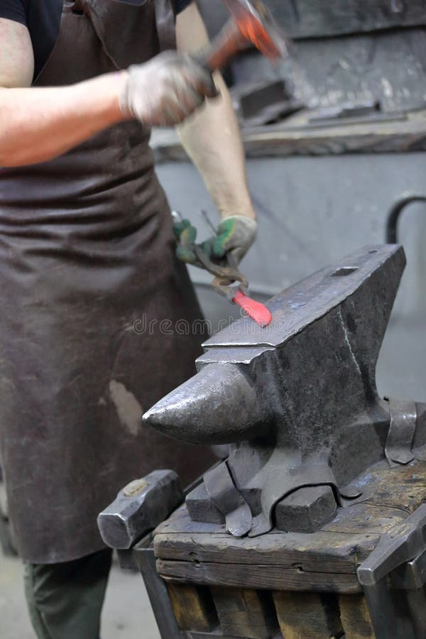 The Process Of Manufacturing A Craft Product In A Forge Stock Photo ...