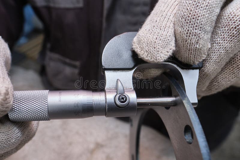 The Process of Measuring the Ring of a Large Diesel Engine in a Machine ...