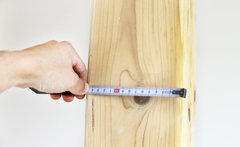 The Process of Measuring the Width Using a Measuring Tape Stock Photo ...