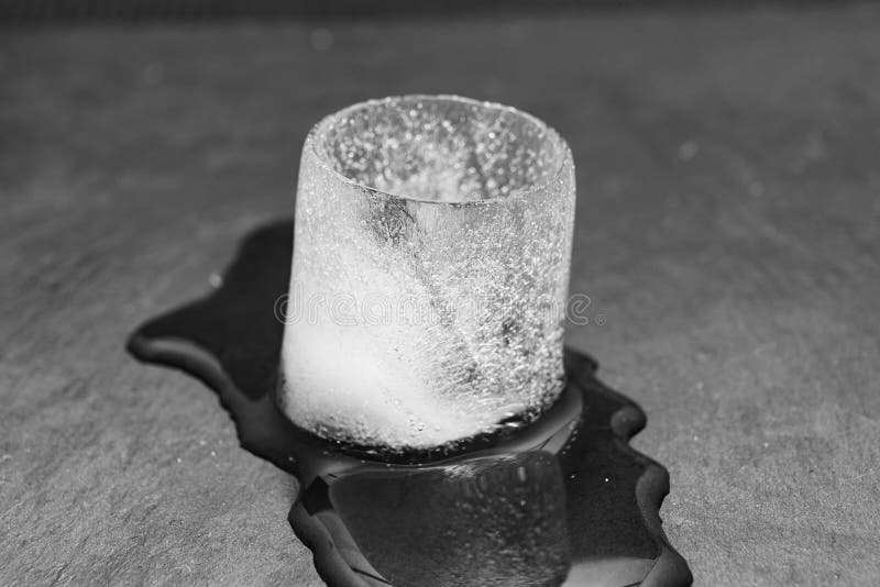 The Process of Melting an Ice Cube. Black-and-white Stock Image - Image ...