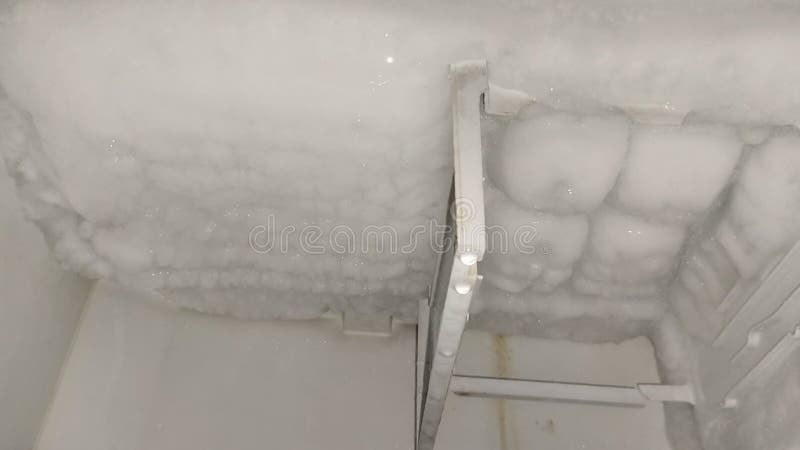 The Process of Melting the Ice in the Refrigerator Stock Video - Video ...