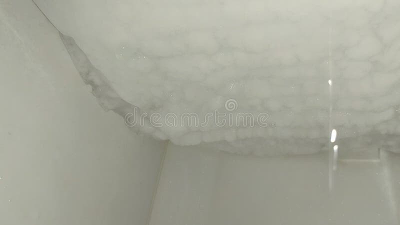 The Process of Melting the Ice in the Refrigerator Stock Video - Video ...
