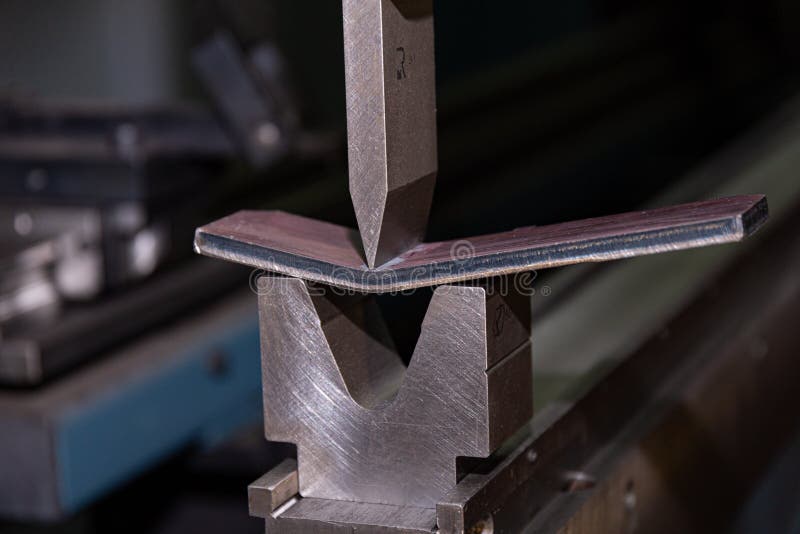 The Process of Metal Bending on a CNC Bending Machine. Bending of Metal ...