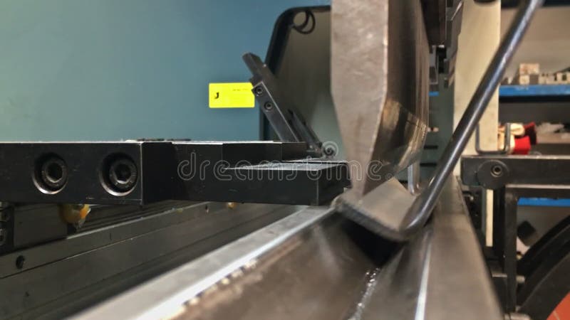 The Process of Metal Bending on a CNC Bending Machine. Bending of Metal ...