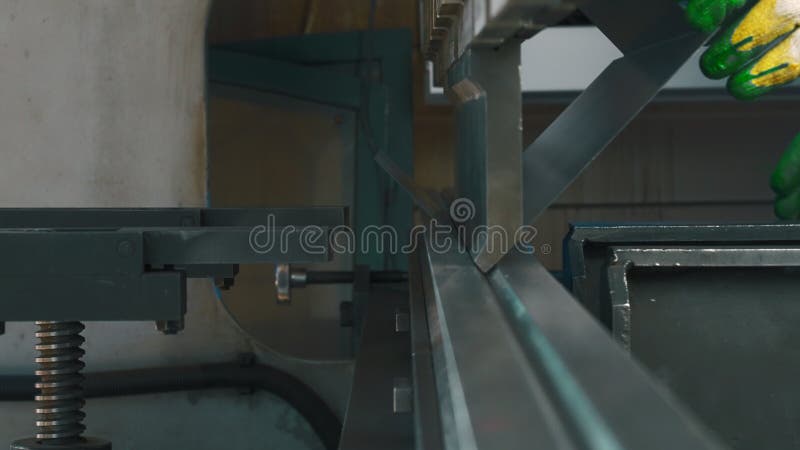 The Process of Metal Sheet Bending on a CNC Bending Machine. Creative ...