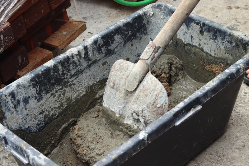 The Process of Mixing Cement at a Construction Site for the ...