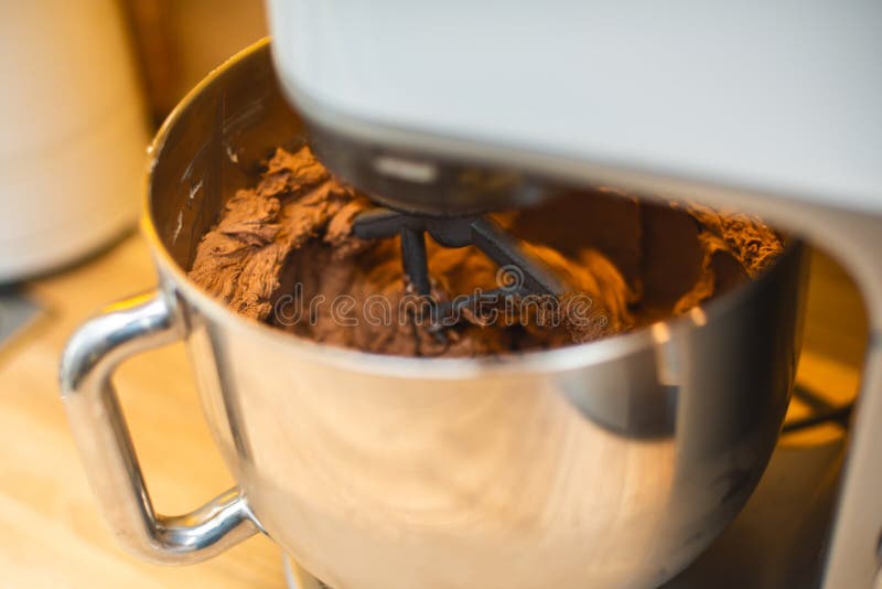 The Process of Mixing Chocolate Cream in the Chrome Bowl of a Food ...