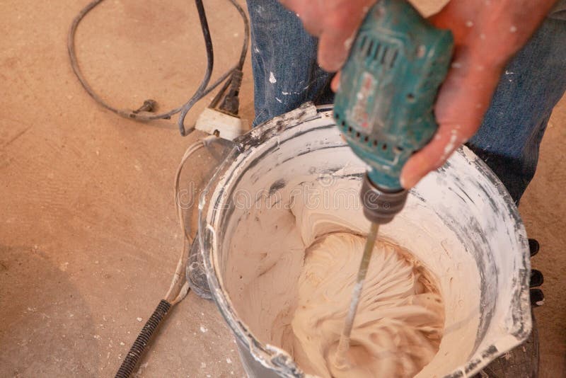 The Process of Mixing Plaster Mortar Putty Stock Image - Image of ...