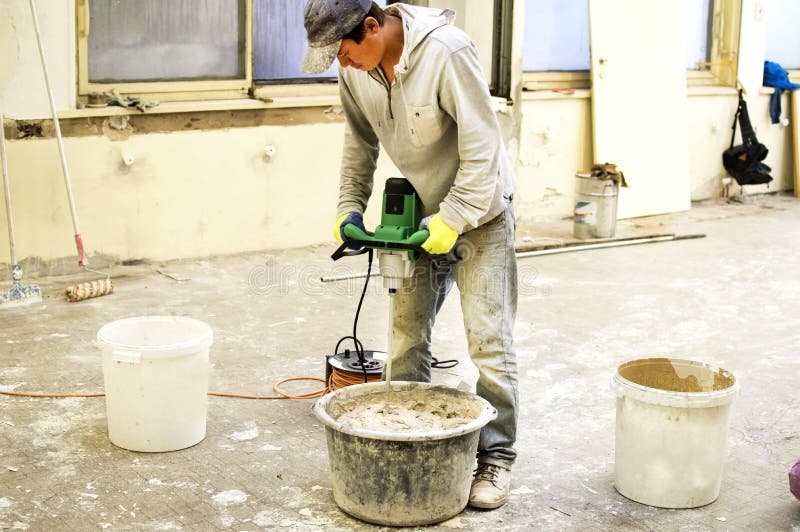 The Process of Mixing Putty Mixture for Construction Stock Image ...