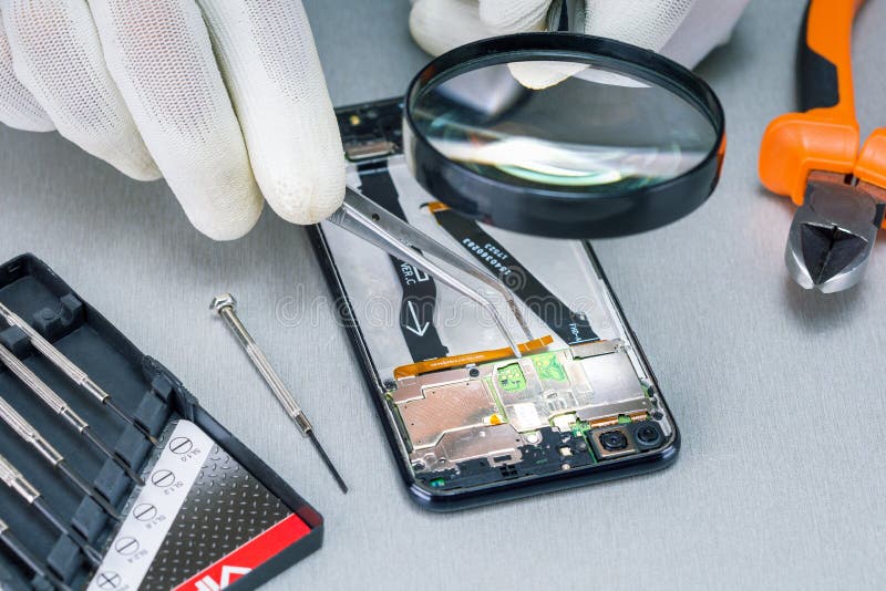 Technician Repairing the Smartphone on the Desk. Editorial Stock Photo ...
