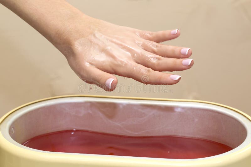 Process Paraffin Treatment of Female Hands Stock Image - Image of nails ...
