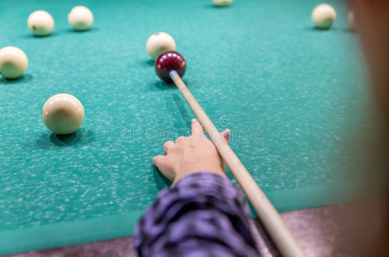 The Process of Playing Billiards with a Cue in Hand at the Billiard ...