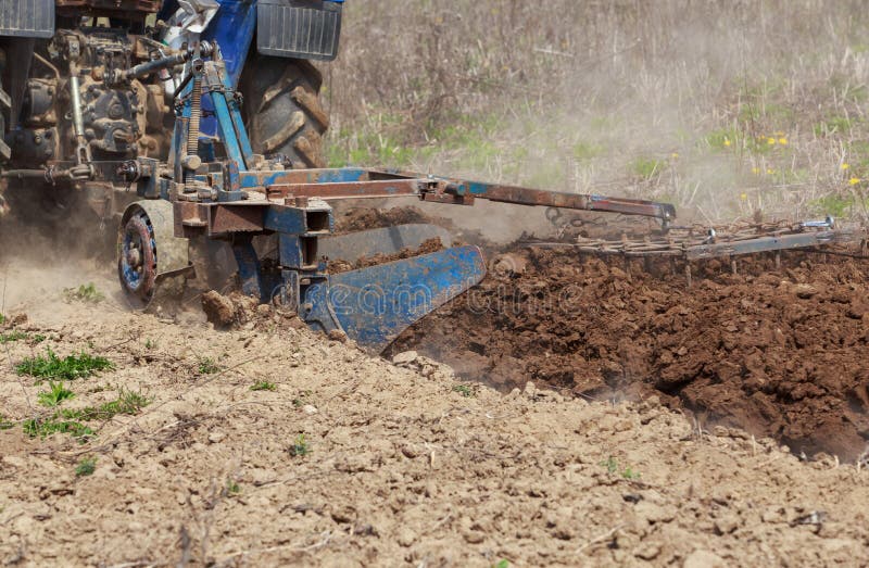 Process of plowing land stock image. Image of rural - 189025207