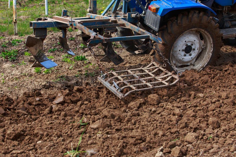Process of plowing land stock photo. Image of nature - 197200760