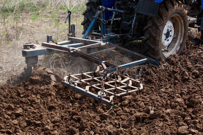 Process of plowing land stock image. Image of farme - 189025379