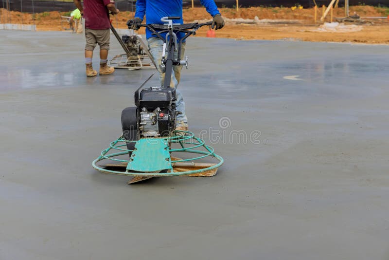 The Process of Polishing and Leveling Cement Screed Mortar Floor on a ...