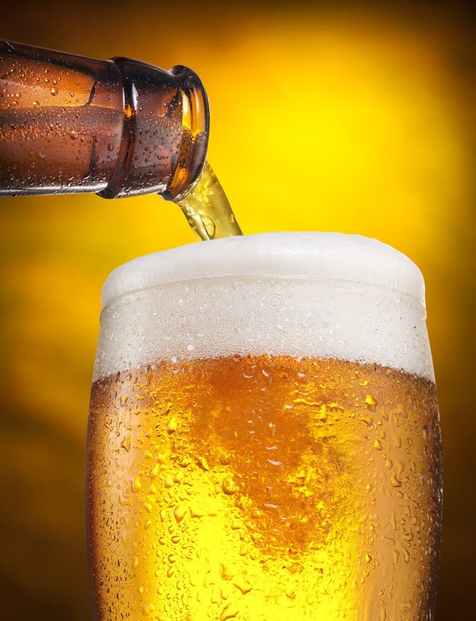 Pouring of beer stock photo. Image of tapster, beer, foam - 7313046