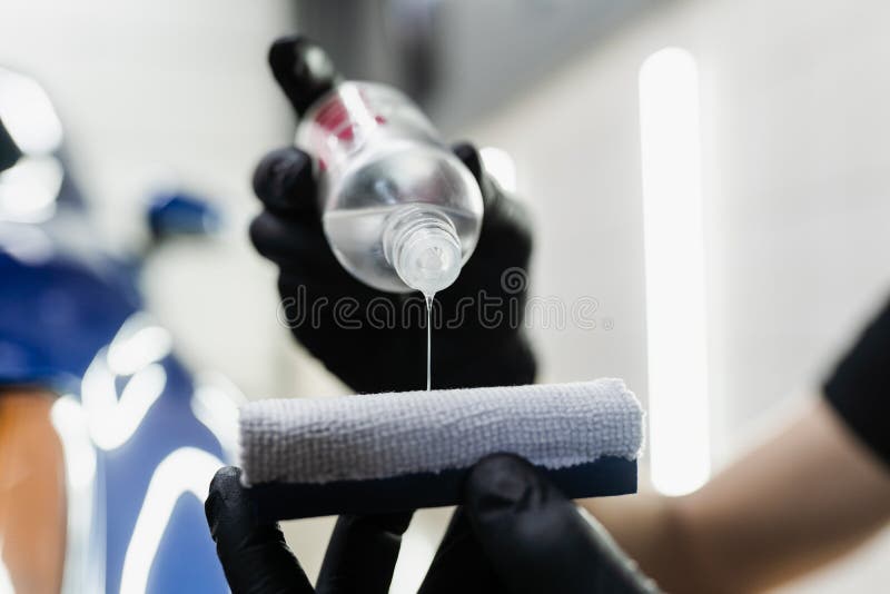 Process of Pouring Ceramic Liquid from Bottle on Sponge To Apply a ...
