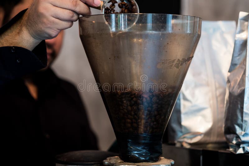 Process of Pouring Coffee Beans into the Grinder Stock Photo - Image of ...