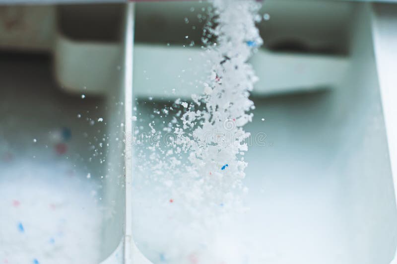 The Process of Pouring Powder into a Washing Machine Stock Photo ...