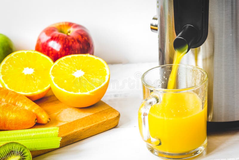 Process Preparation of Fresh Juice in Juicer Stock Photo - Image of ...