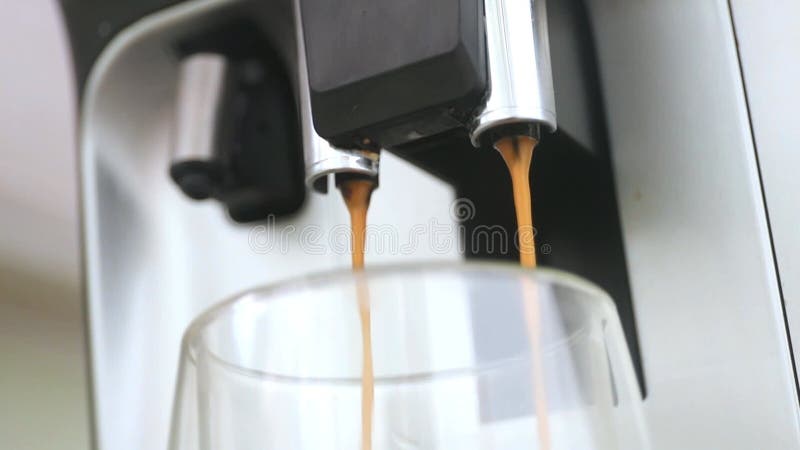 Process of Preparing Freshly Ground Coffee in a Coffee Machine Stock ...