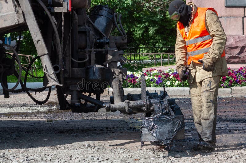 The Process of Preparing for the Laying of New Asphalt Stock Photo ...