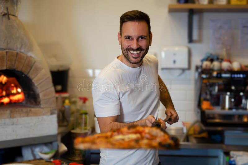 A Process of Preparing Pizza by a Chef.Italian Traditional Pizza is ...