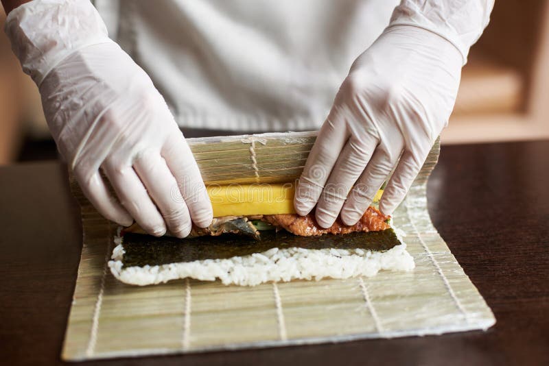 Process of Preparing Rolling Sushi Stock Image - Image of hands, lunch ...