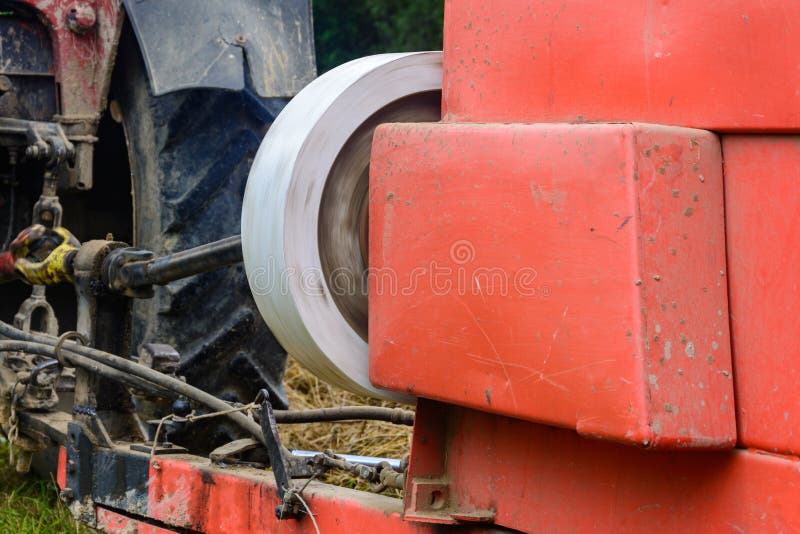 The Process of Pressing Hay into Bales, the Work of the Press Machine ...