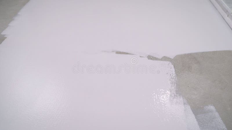 The Process of Priming a Plastered Surface. Concrete Floor Primer To ...