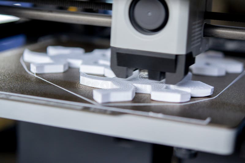 Process of Printing on 3D Printer. 3D Printer Creating Model from ...