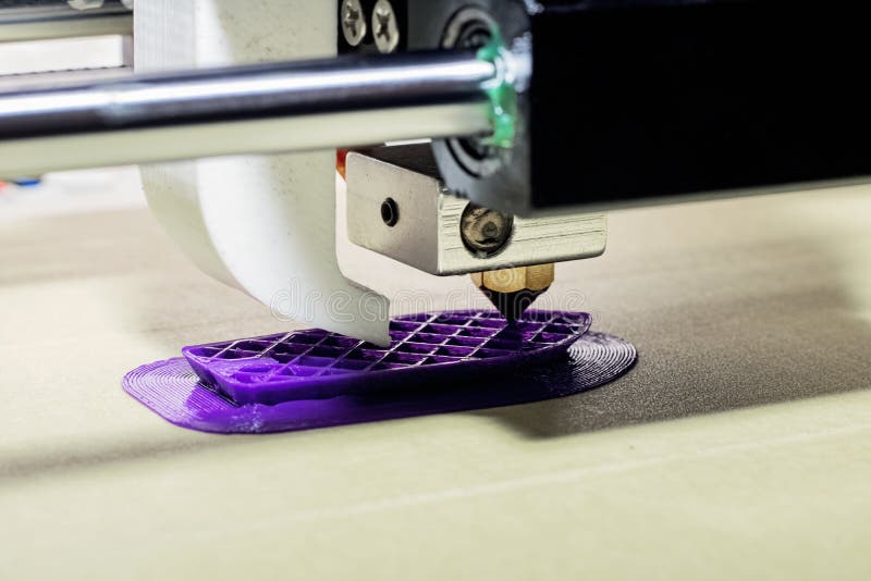 The Process of Printing from Plastic To a 3D Printer Stock Photo ...