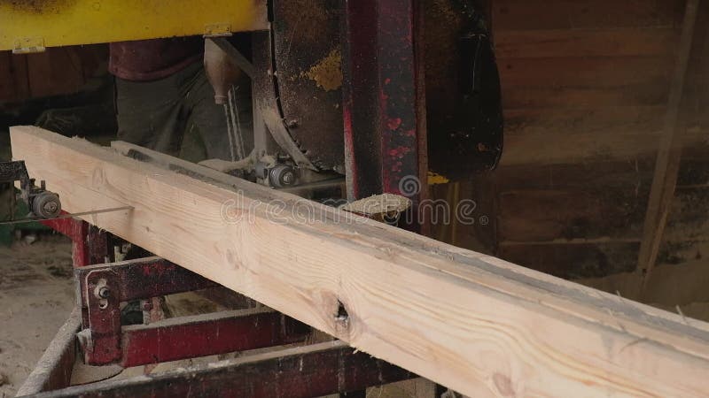 The Process of Processing and Sawing Wood at an Old Sawmill. Sawing and ...