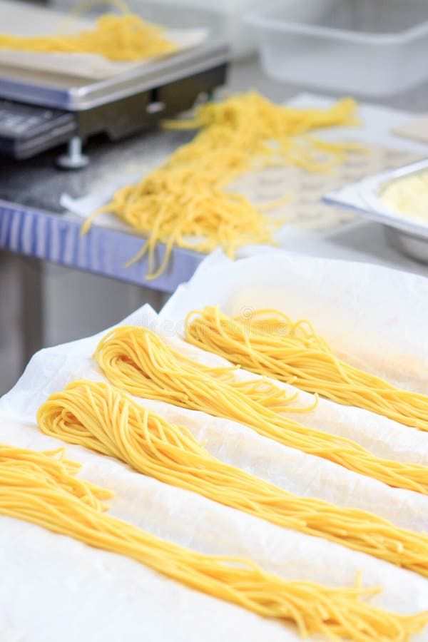 Process of Production of Pasta. Manufacture of Fresh Spaghetti Stock ...