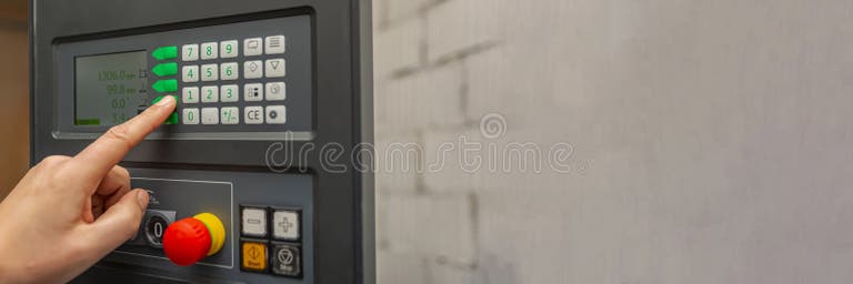 The Process of Programming a CNC Machine. Entering Data into a Computer Controlled Machine Stock ...