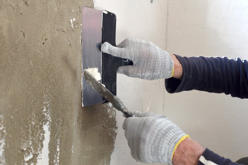 The Process of the Concrete Wall Putty Two Spatulas Stock Photo - Image ...