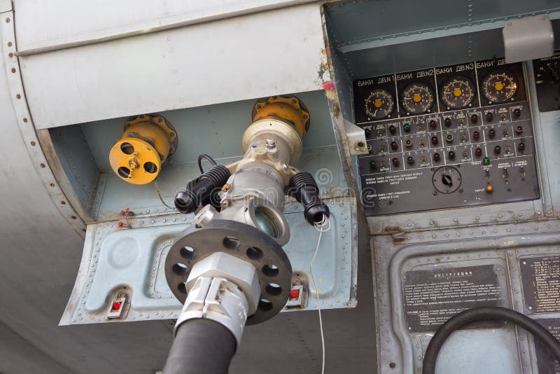 Refueling an airplane stock image. Image of passenger - 1193785