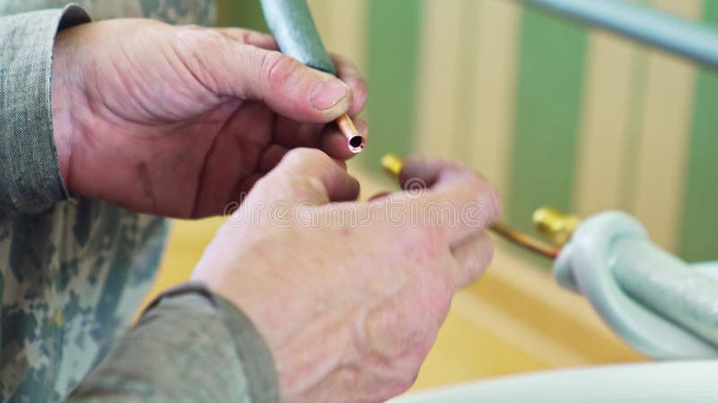 The Process of Rolling Copper Tubes of the Freon Pipeline Stock Video ...