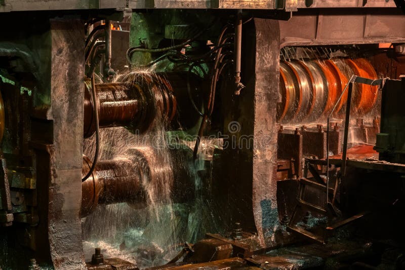 The Process of Rolling Hot Rolled Steel in a Rolling Mill Stock Photo ...