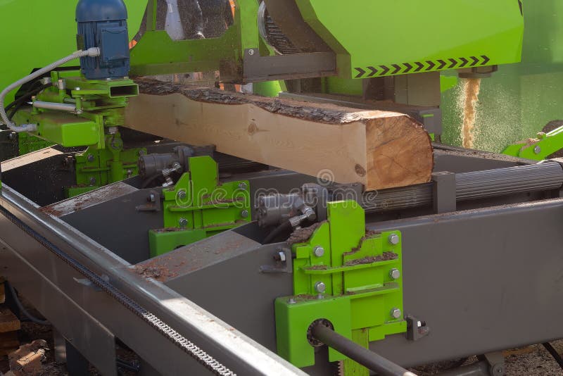 The Process of Sawing Wood on Sawmill Equipment Stock Photo - Image of ...