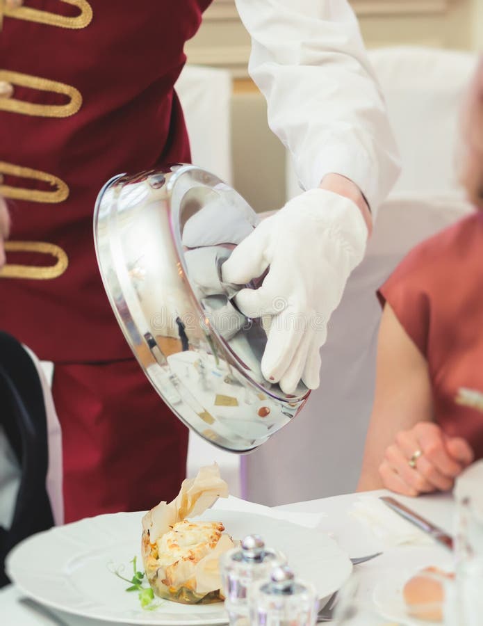Process of Serving Luxury Dinner in a Cloche Plate Dish with a Lid ...