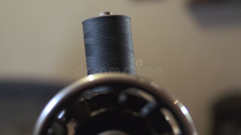 Process of Sewing Fabric. Closeup Skein of Black Thread on a Working ...