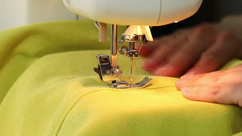 The Process of Sewing Fabric on a Sewing Machine, the Sewing Machine ...