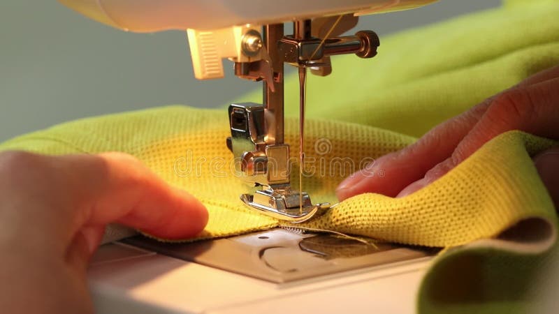 The Process of Sewing Fabric on a Sewing Machine, the Sewing Machine ...
