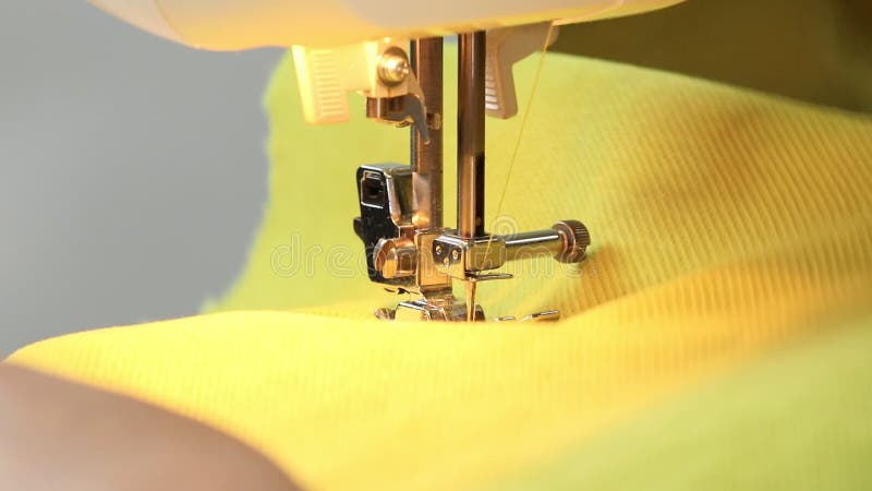 The Process of Sewing Fabric on a Sewing Machine, the Sewing Machine ...