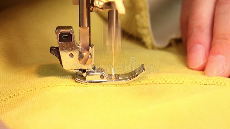 The Process of Sewing Fabric on a Sewing Machine, the Sewing Machine ...